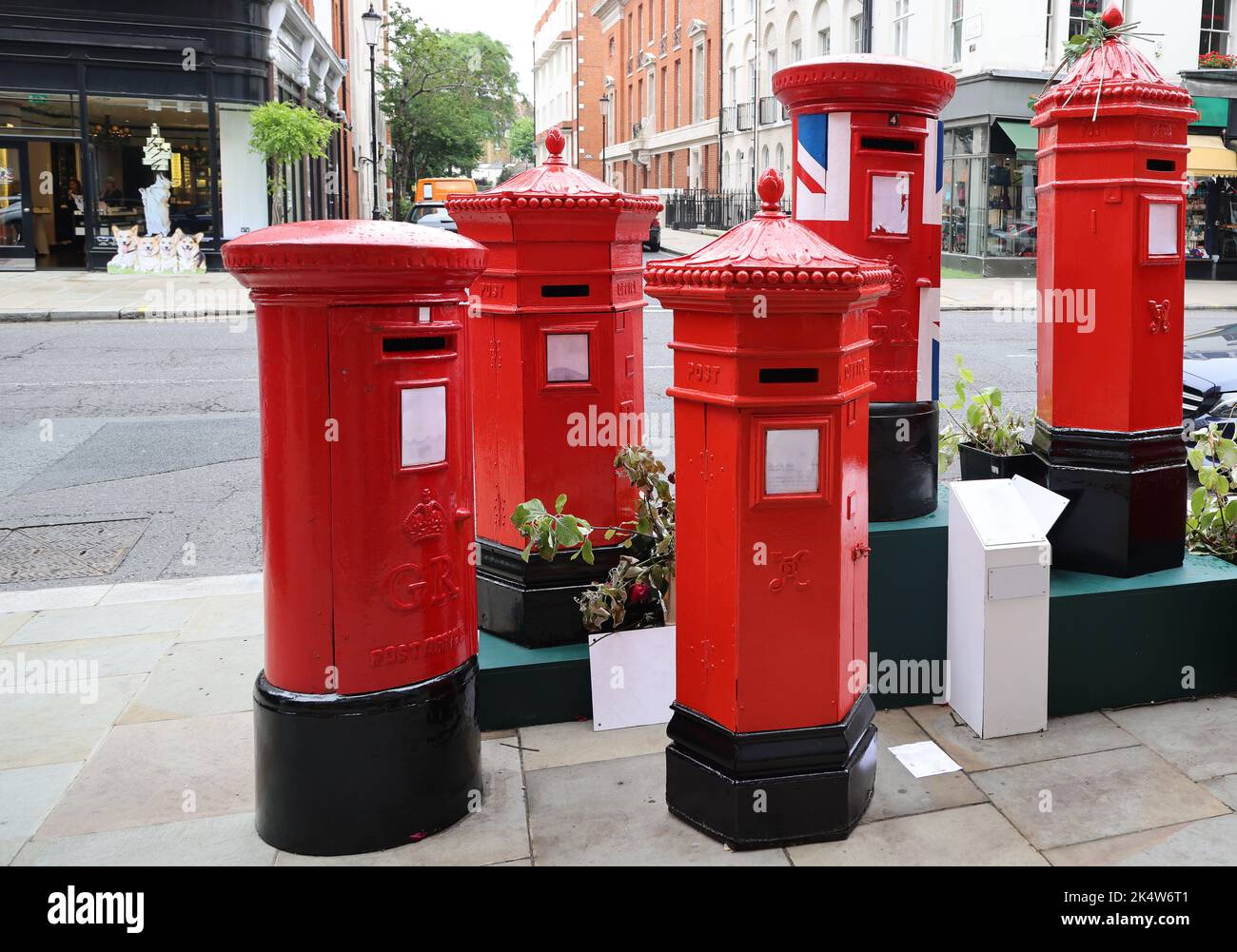 Group of public mailboxes in the city of London Stock Photo - Alamy
