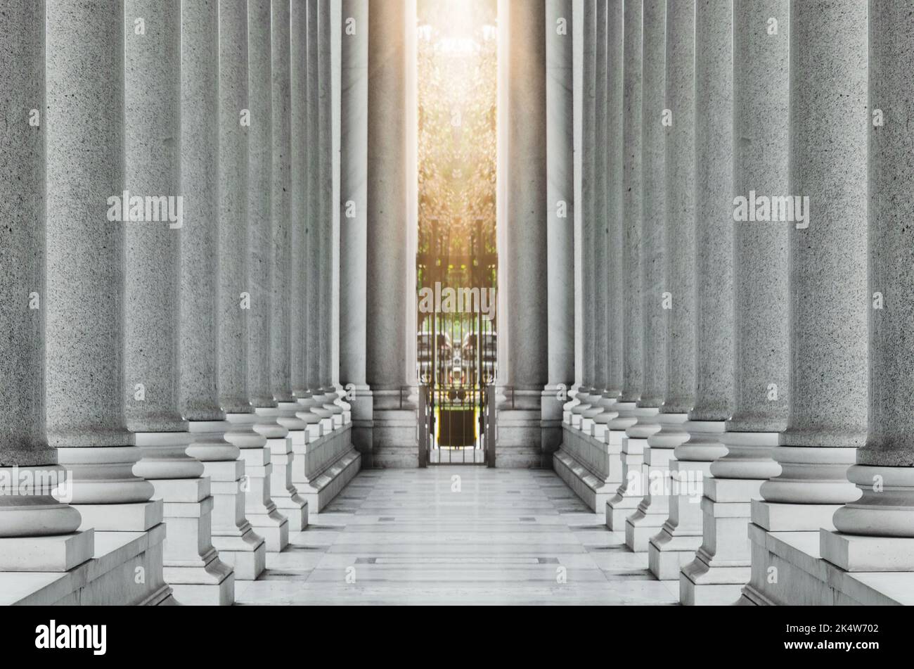 White marble pillars in a row. Row of marble columns. Stone columns ...