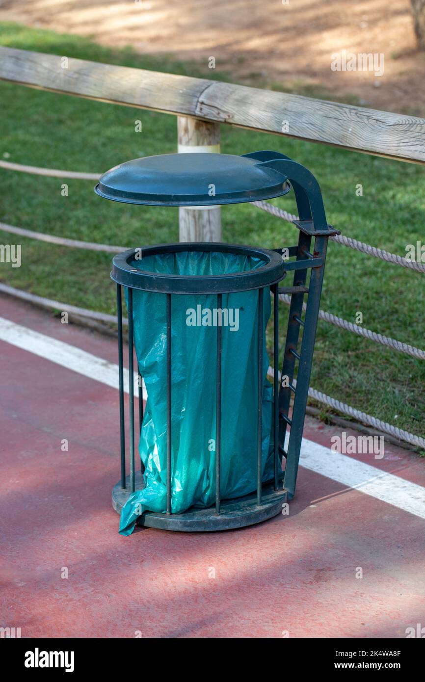 Garbage bin placed in the park area Stock Photo - Alamy