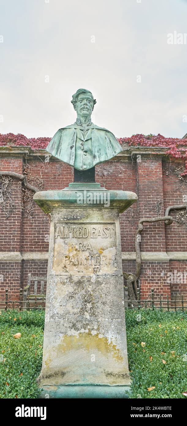 Bust statue, of the painter Alfred East, outside the art gallery named ...