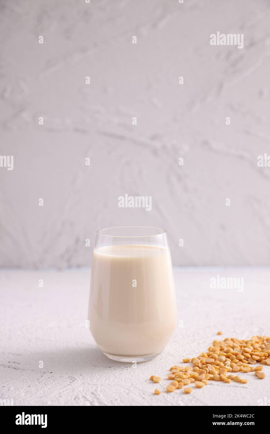 Soy milk in glass and soy bean isolated in white background Stock Photo ...