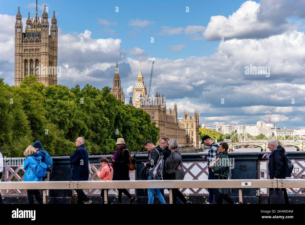 British People and People From Around The World Queue On Lambeth Bridge ...