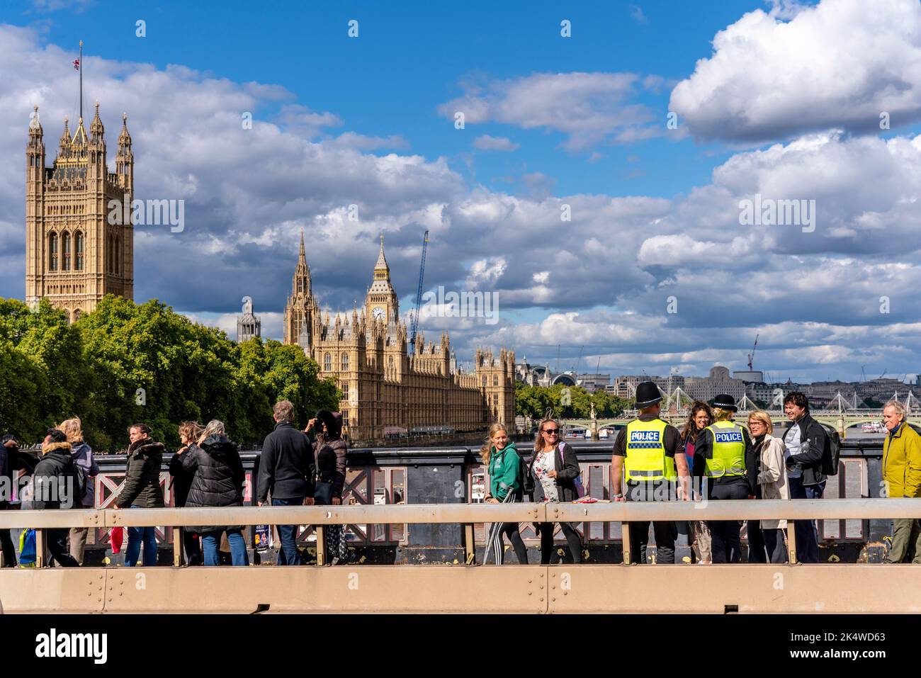 British People and People From Around The World Queue On Lambeth Bridge ...