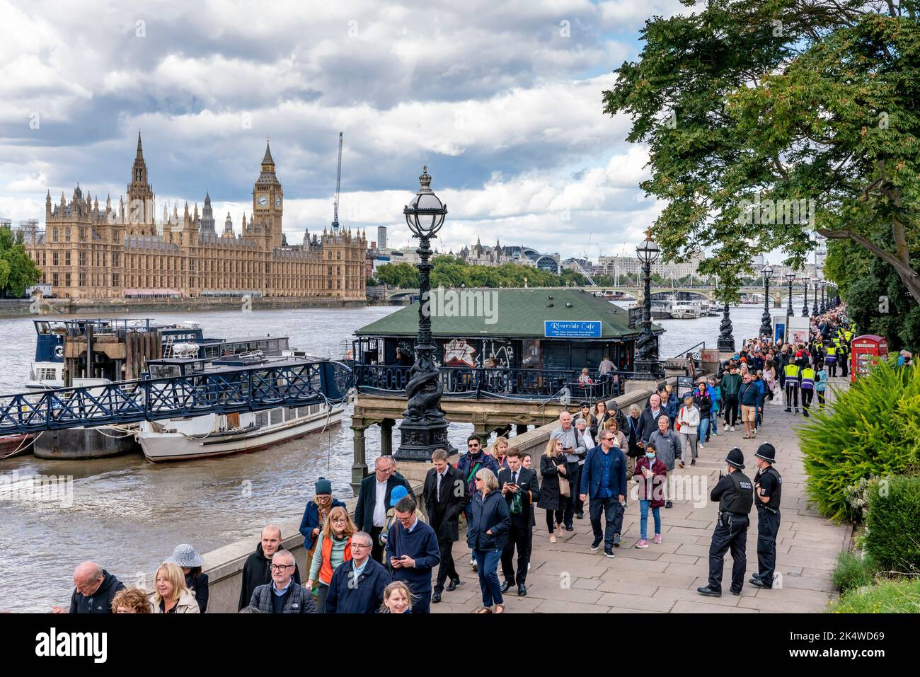 British People and People From Around The World Queue By The Side Of ...