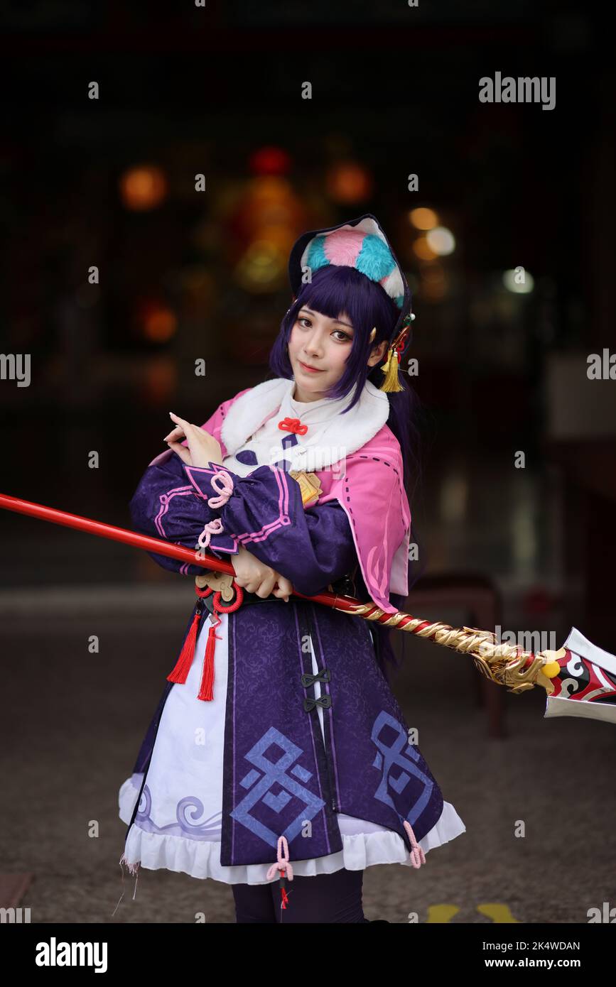 Portrait of a beautiful young woman game Cosplay with Chinese dress ...