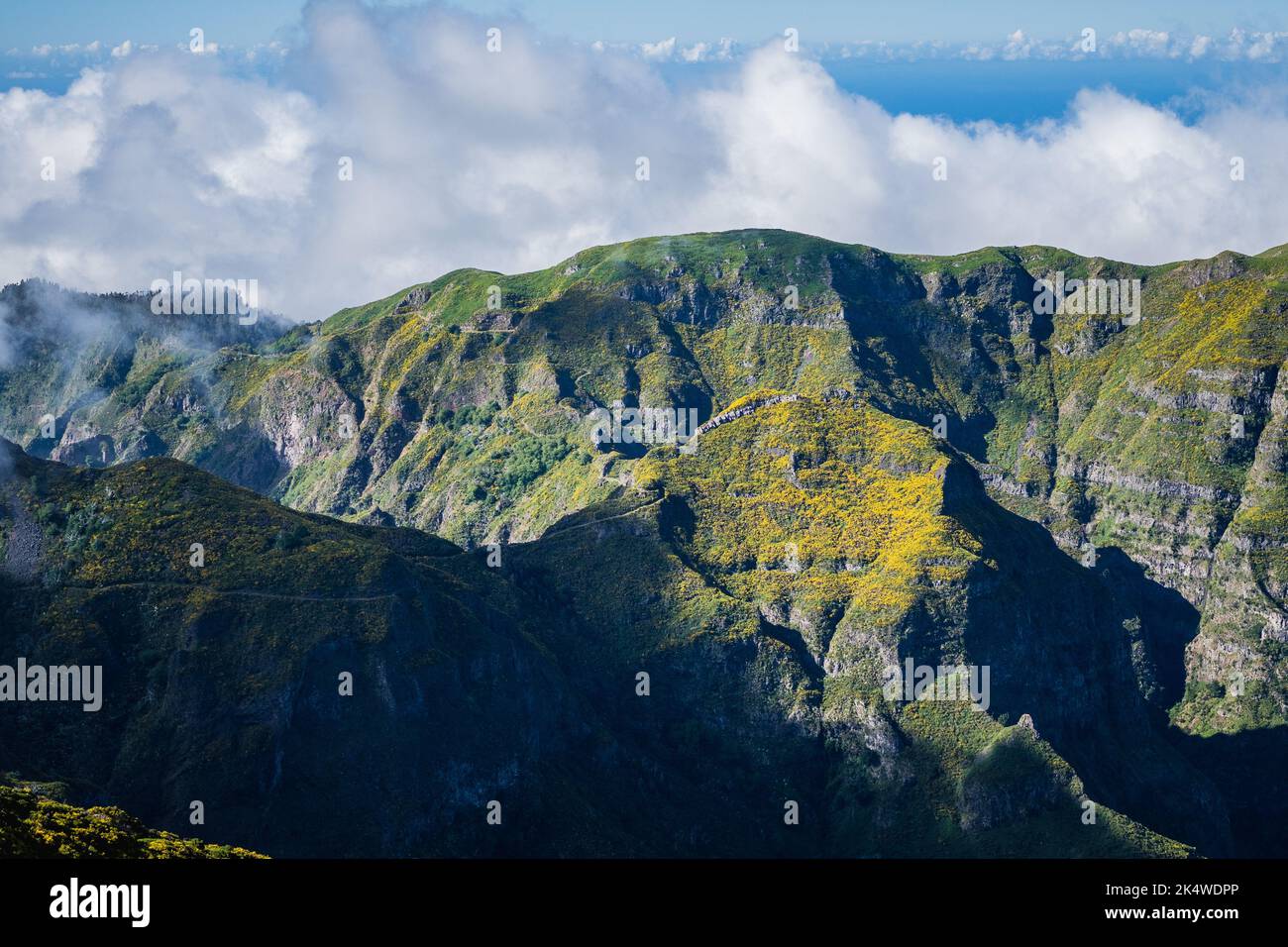 Aerial view of clouds over inland mountain range, Madeira, Portugal ...