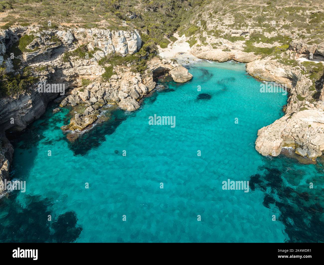 Aerial view of beach with turquoise water, Cala Marmols, Majorca, Spain ...