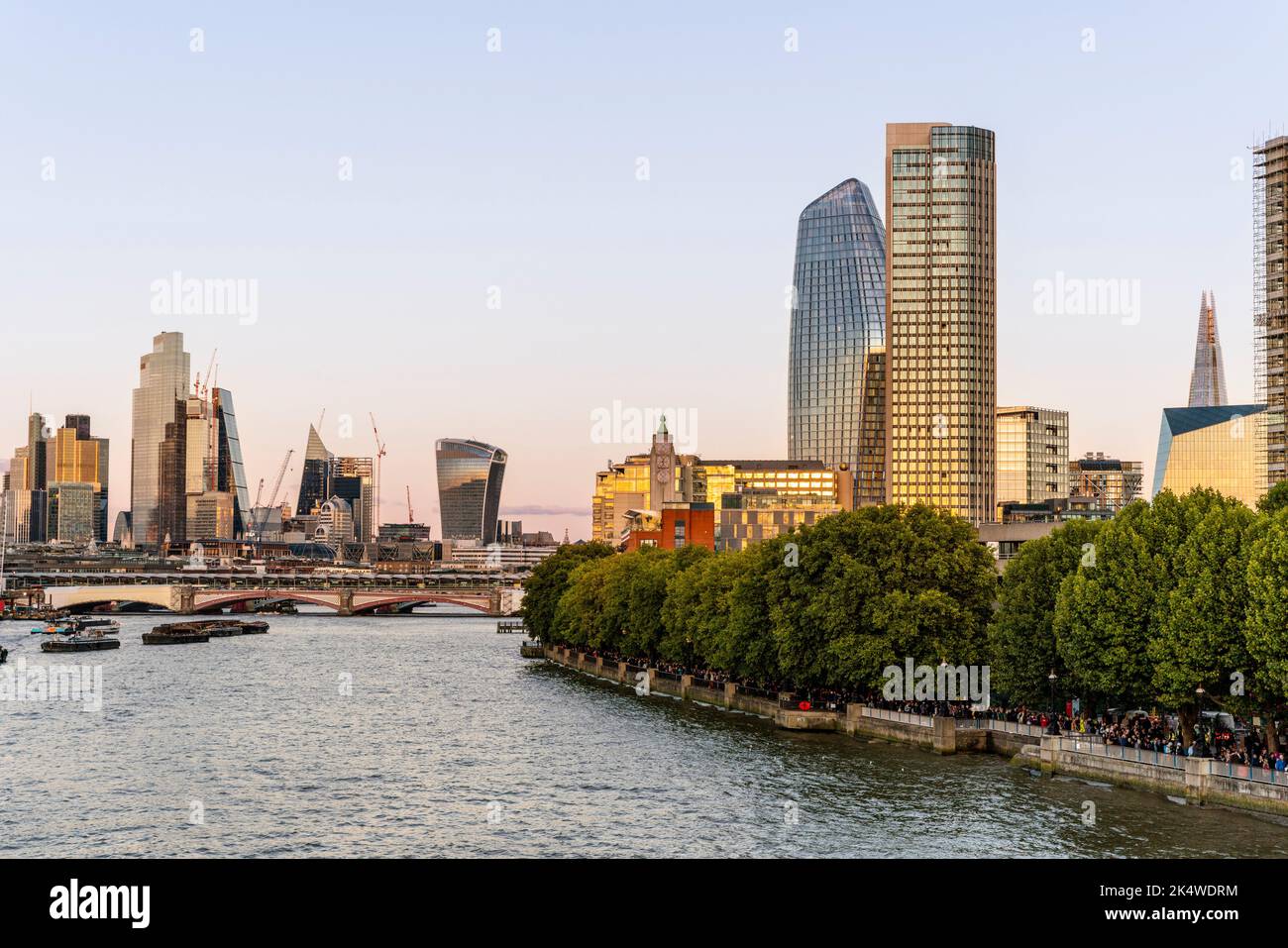 British People and People From Around The World Queue Along The South ...
