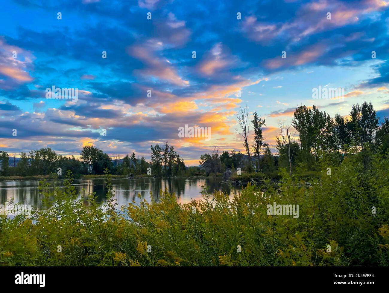 Sunset over Munson Pond, Kelowna, British Columbia, Canada Stock Photo ...