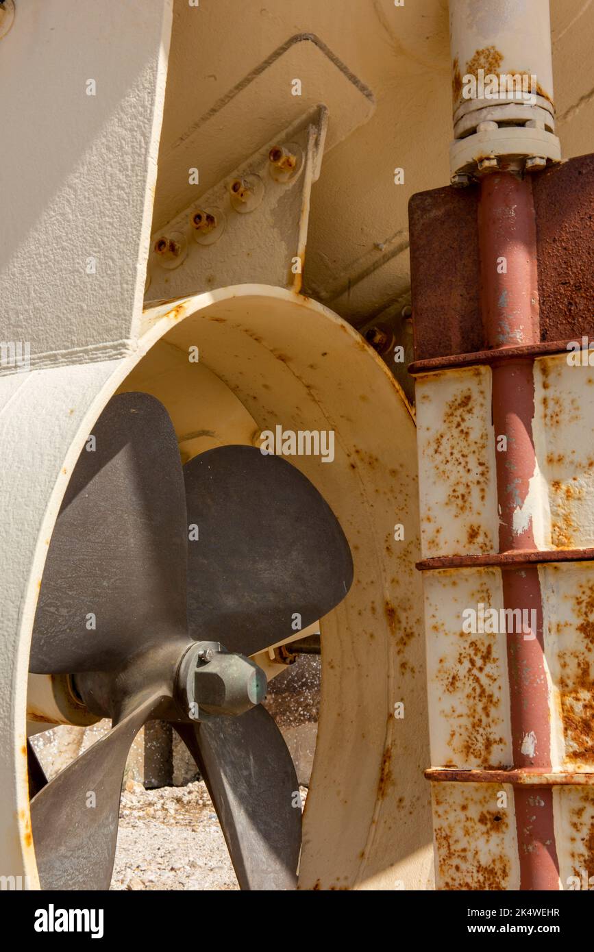 propellor and rudder on the bottom of an old boat. bottom of boat out ...