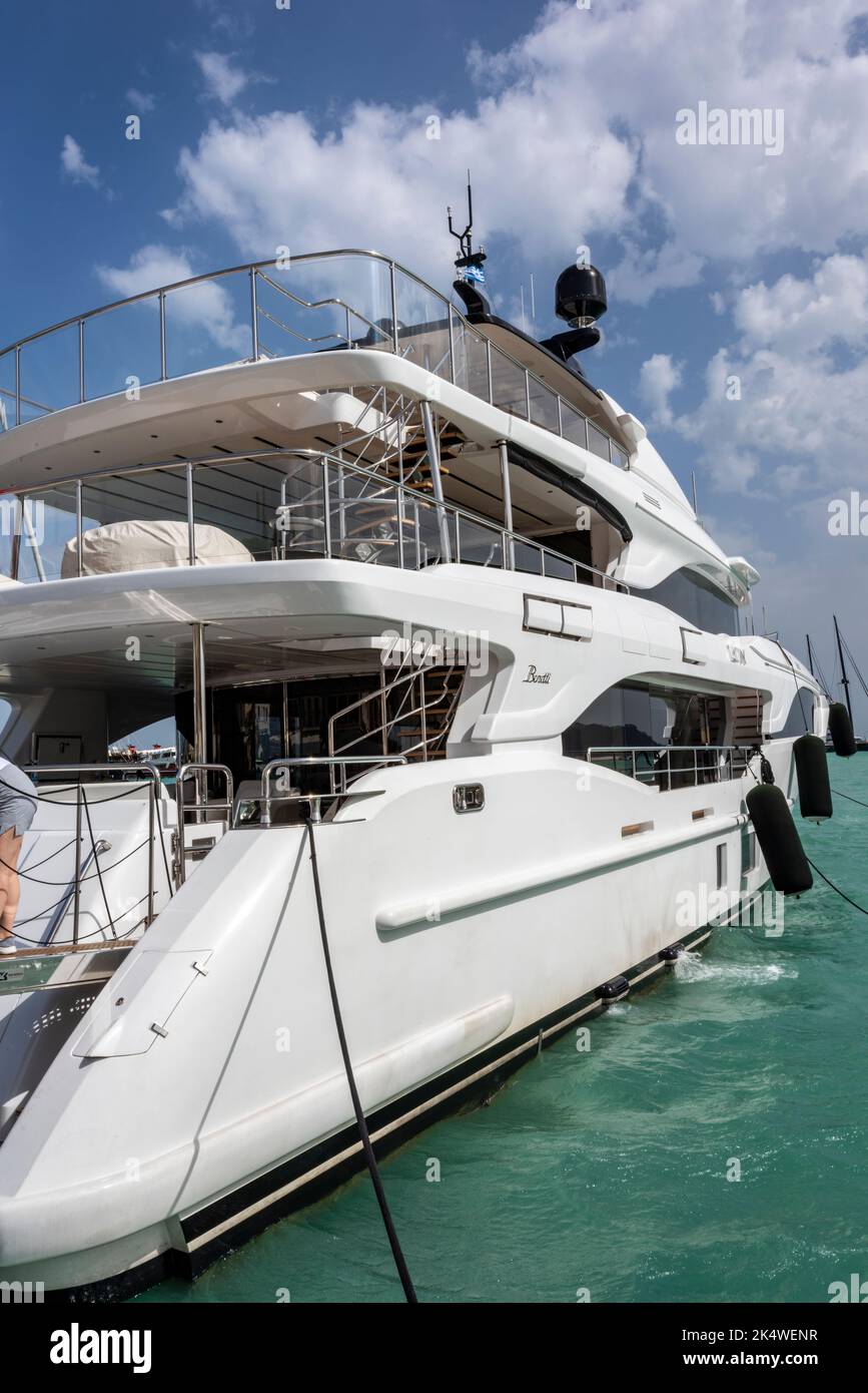 large luxury motor cruiser or powerboat on the quay in the harbour at ...