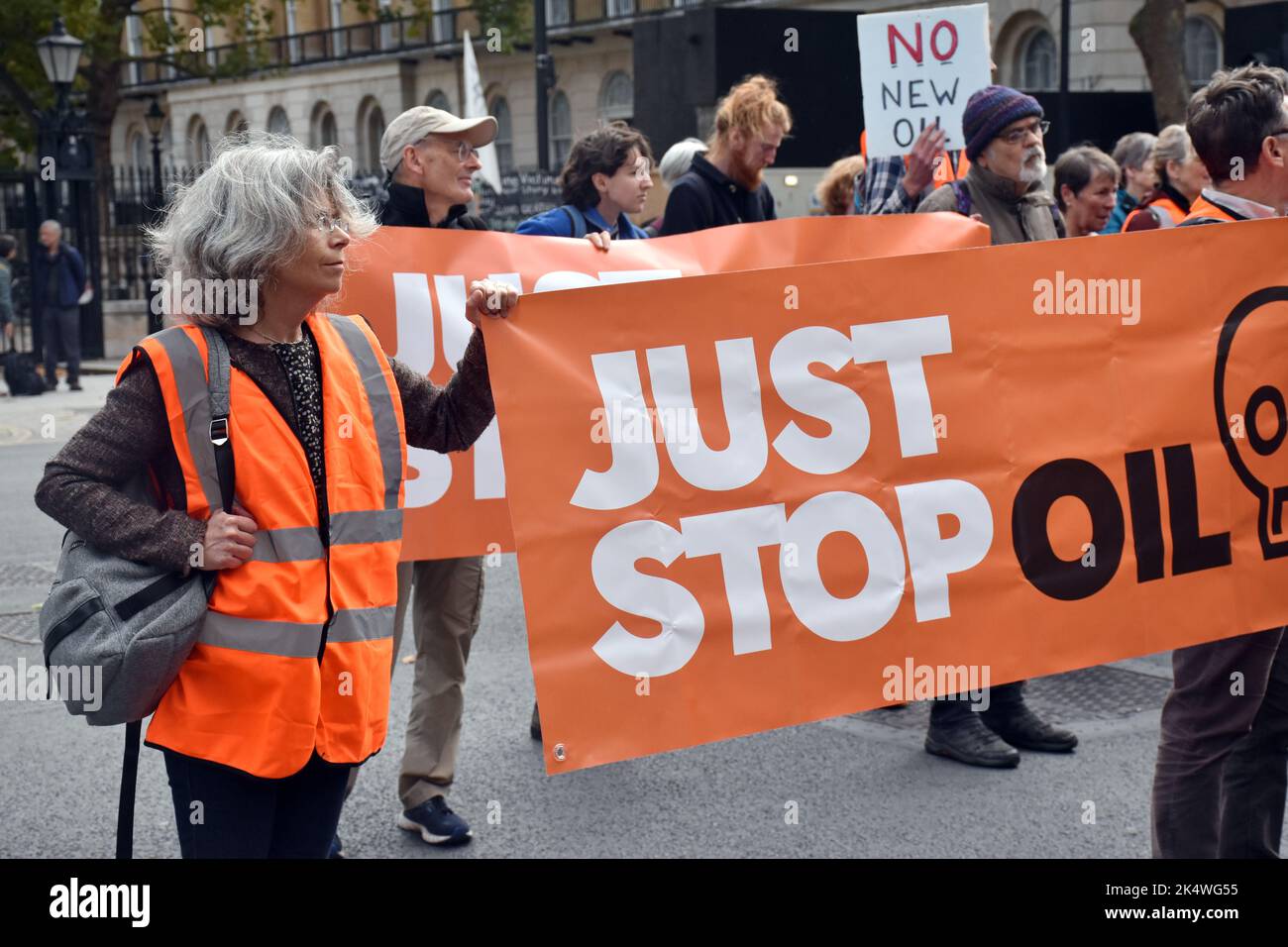 London, UK. 4th Oct, 2022. Just Stop Oil protesters glue themselves to ...