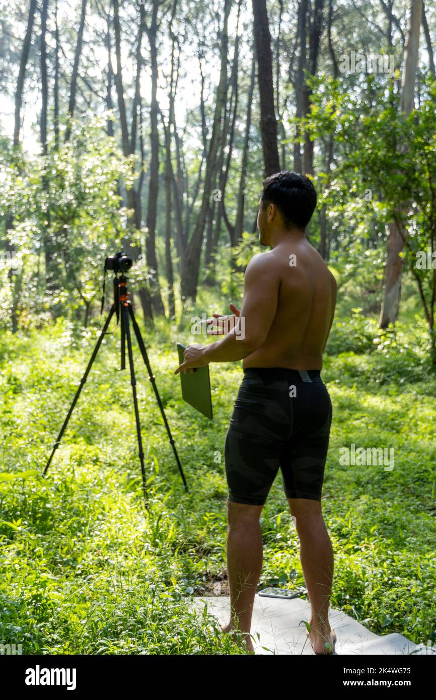 Mature middle-aged athlete man standing in stand position in sporty ...