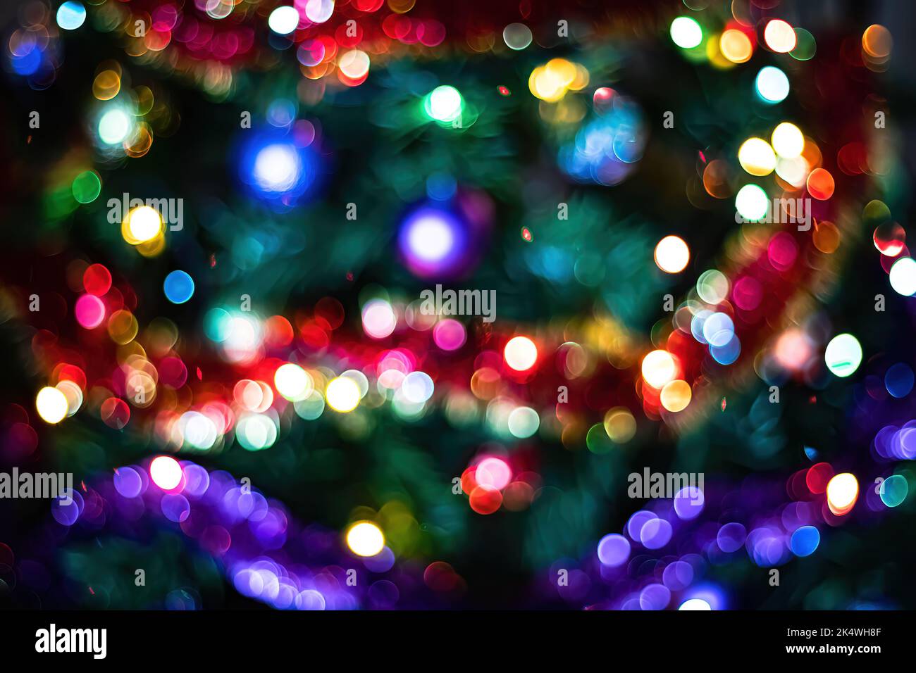 Bright colored defocus lights. Festive Christmas background. Multi ...
