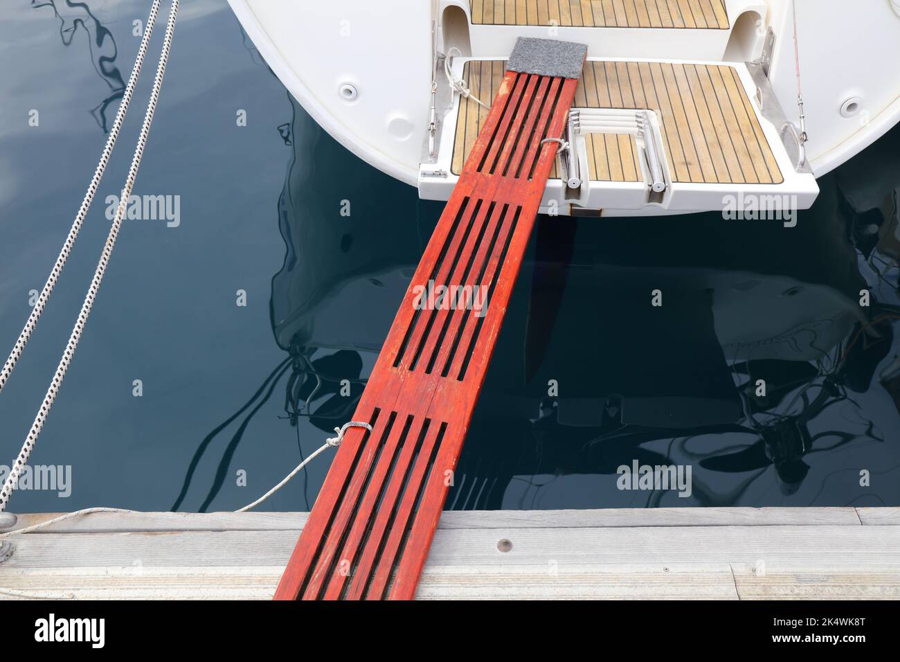 Sailing in Split, Croatia. Sailing yacht wooden boarding gangplank ...