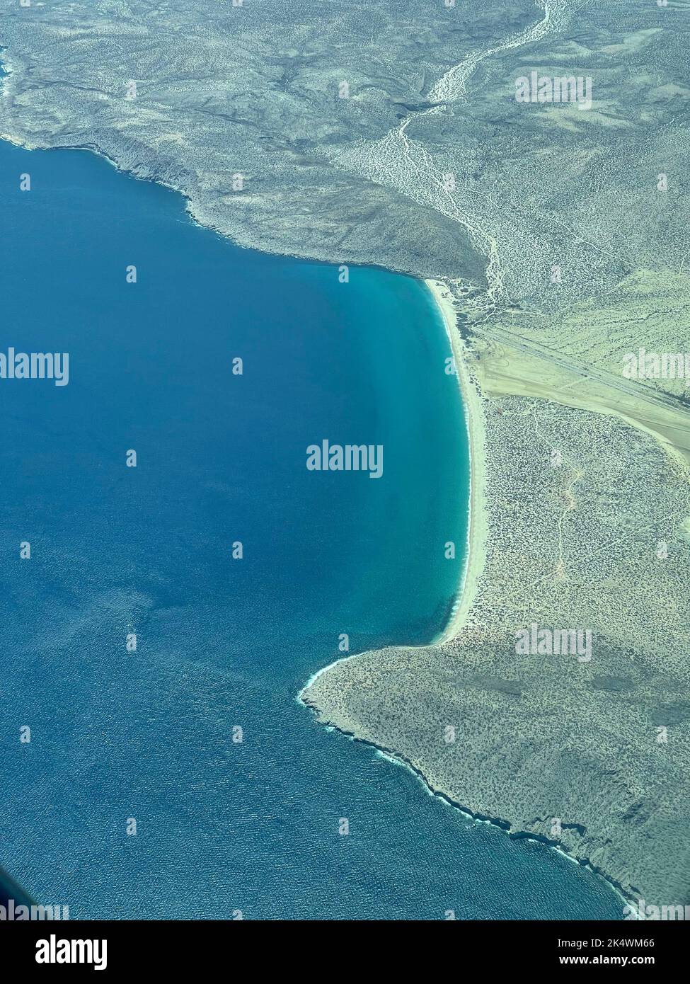 Aerial view of the ocean, beach and desert in the Gulf of California ...
