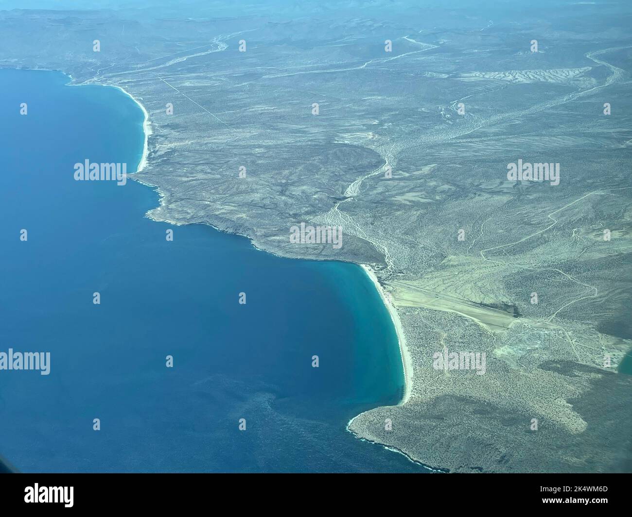 Aerial view of the ocean, beach and desert in the Gulf of California ...
