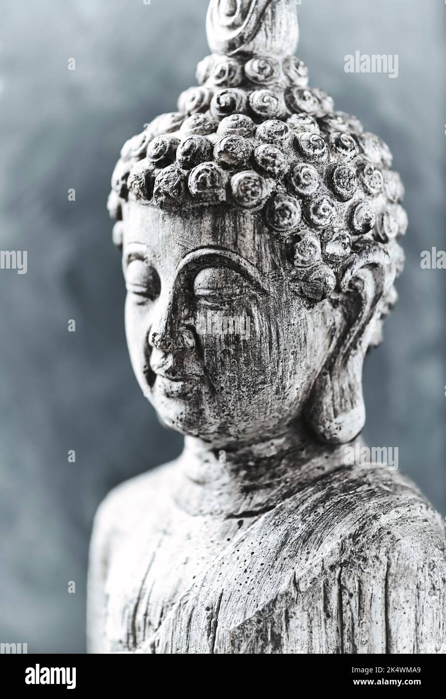 Meditating Buddha Statue on bright background. Close up Stock Photo - Alamy