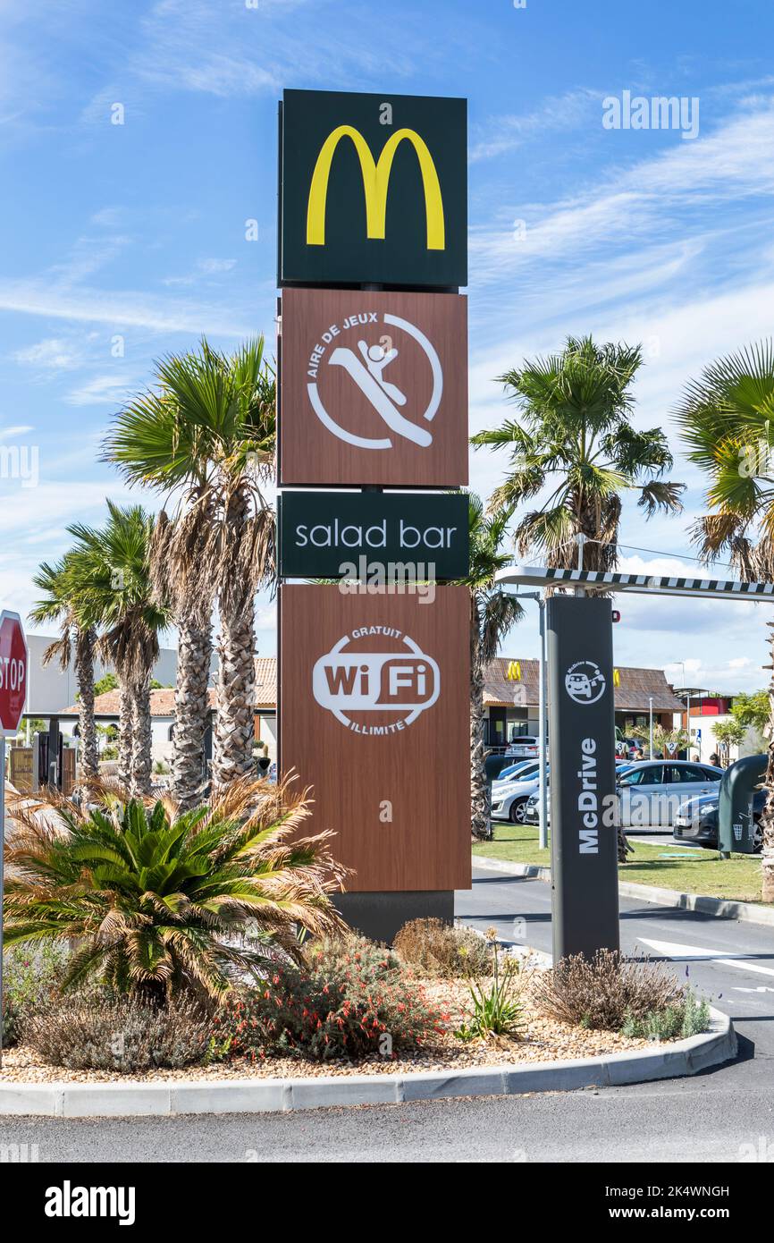 The entrance sign to McDonalds restaurant, Le Barcares, France Stock ...