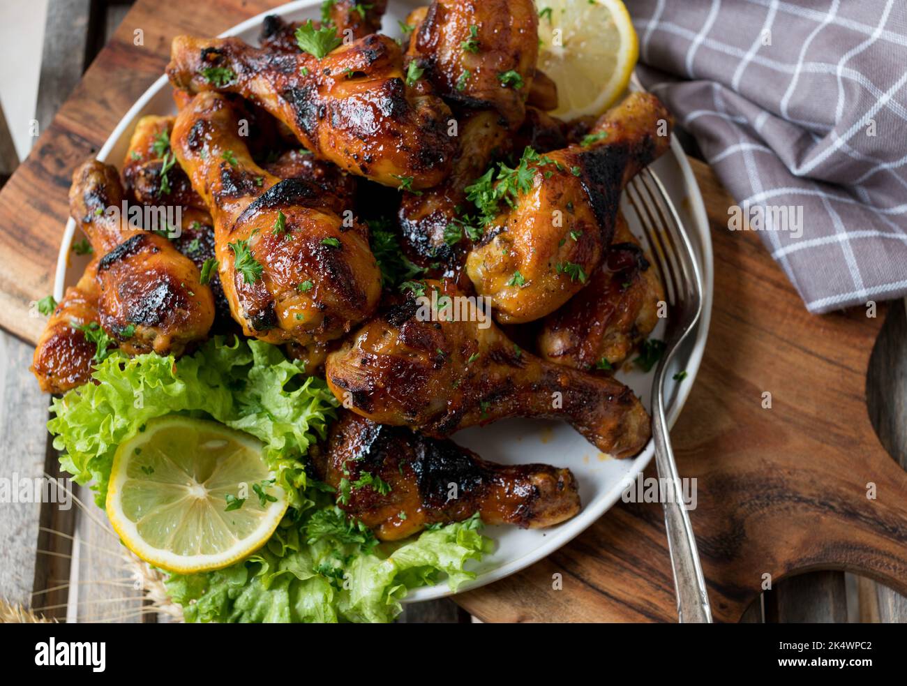 Rustic chicken barbecue plate hi-res stock photography and images - Alamy