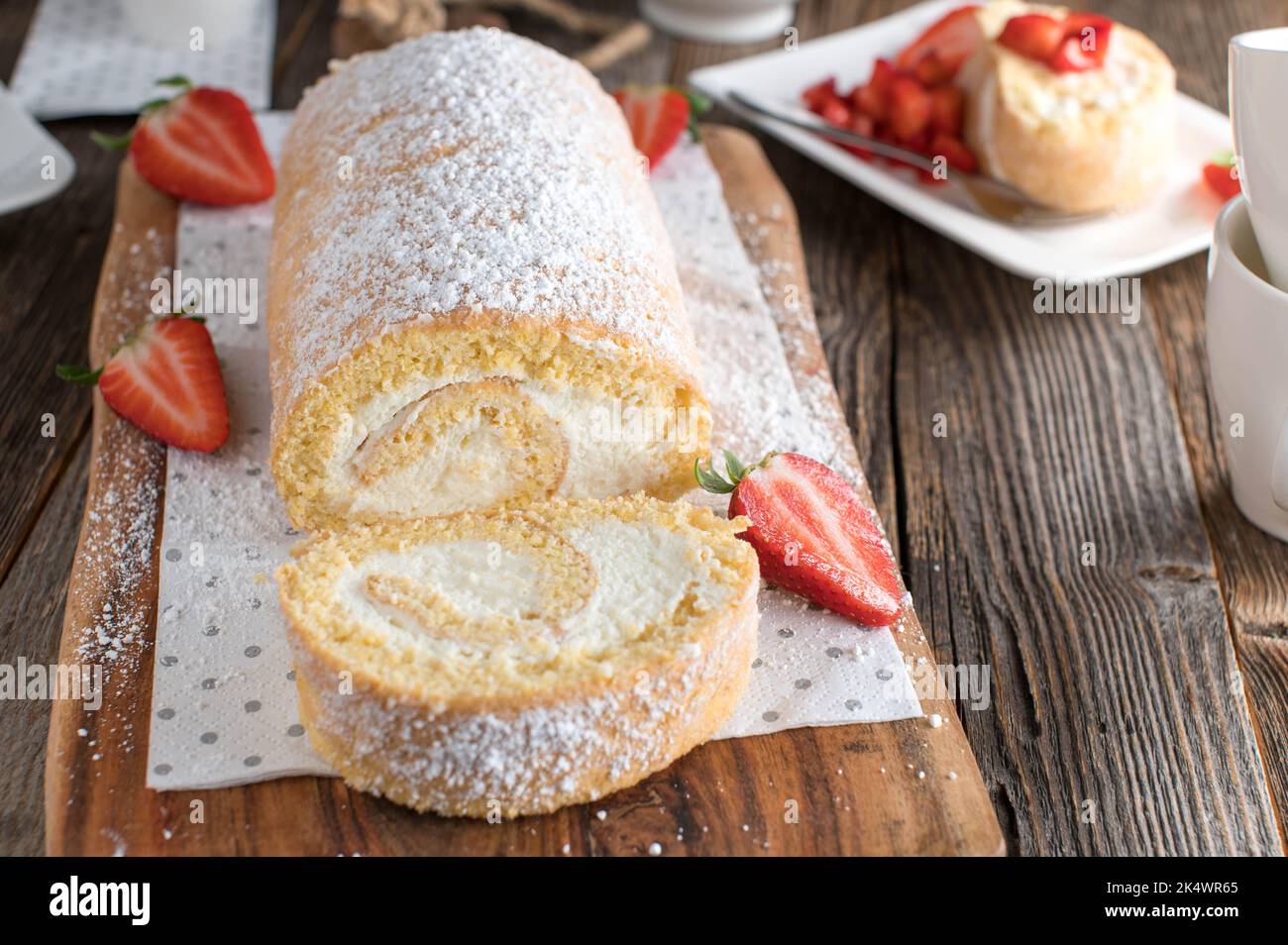 Stuffed cream pastry roll hi-res stock photography and images - Alamy
