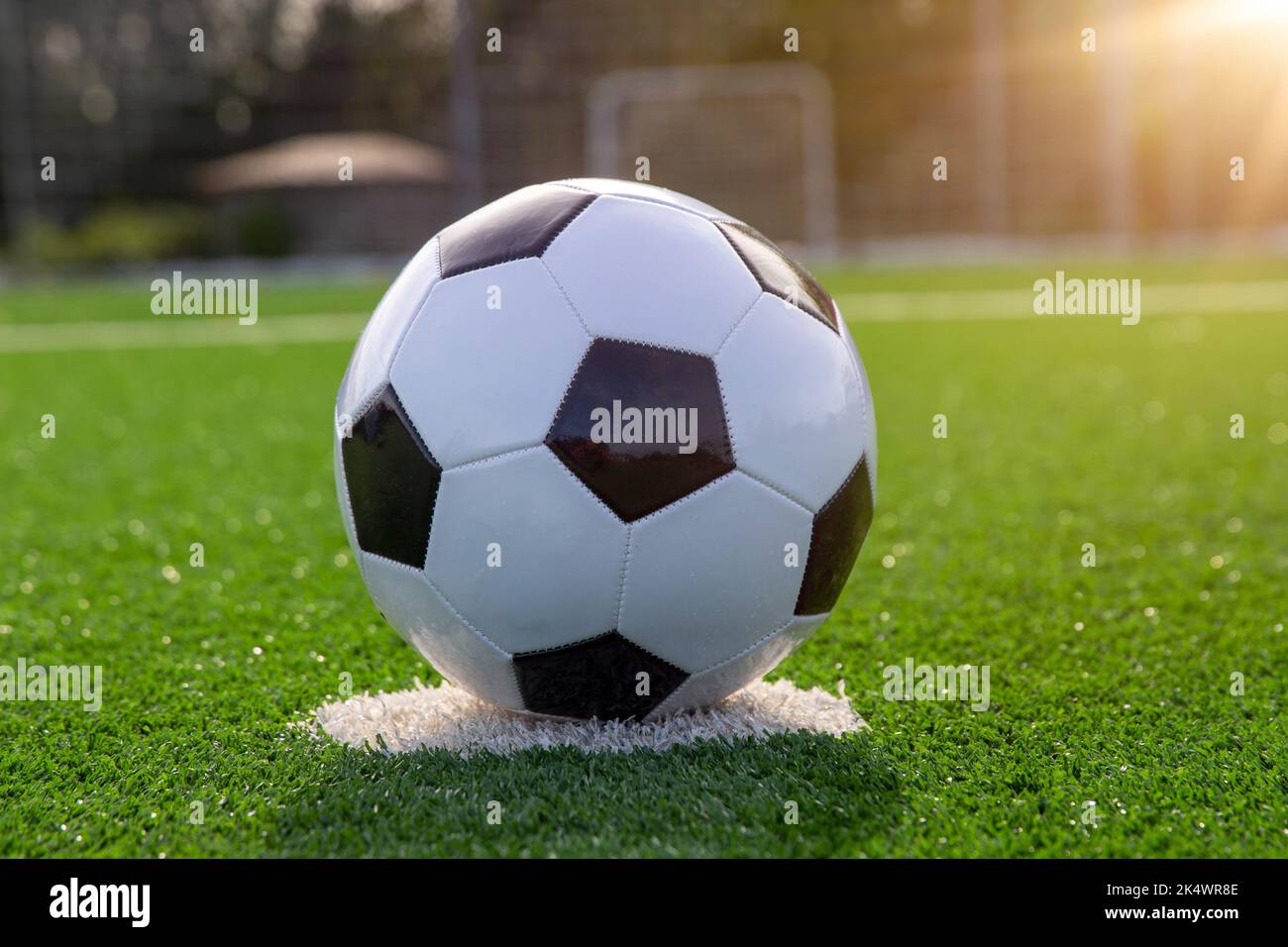 Symbol image: Football on an empty football field Stock Photo - Alamy