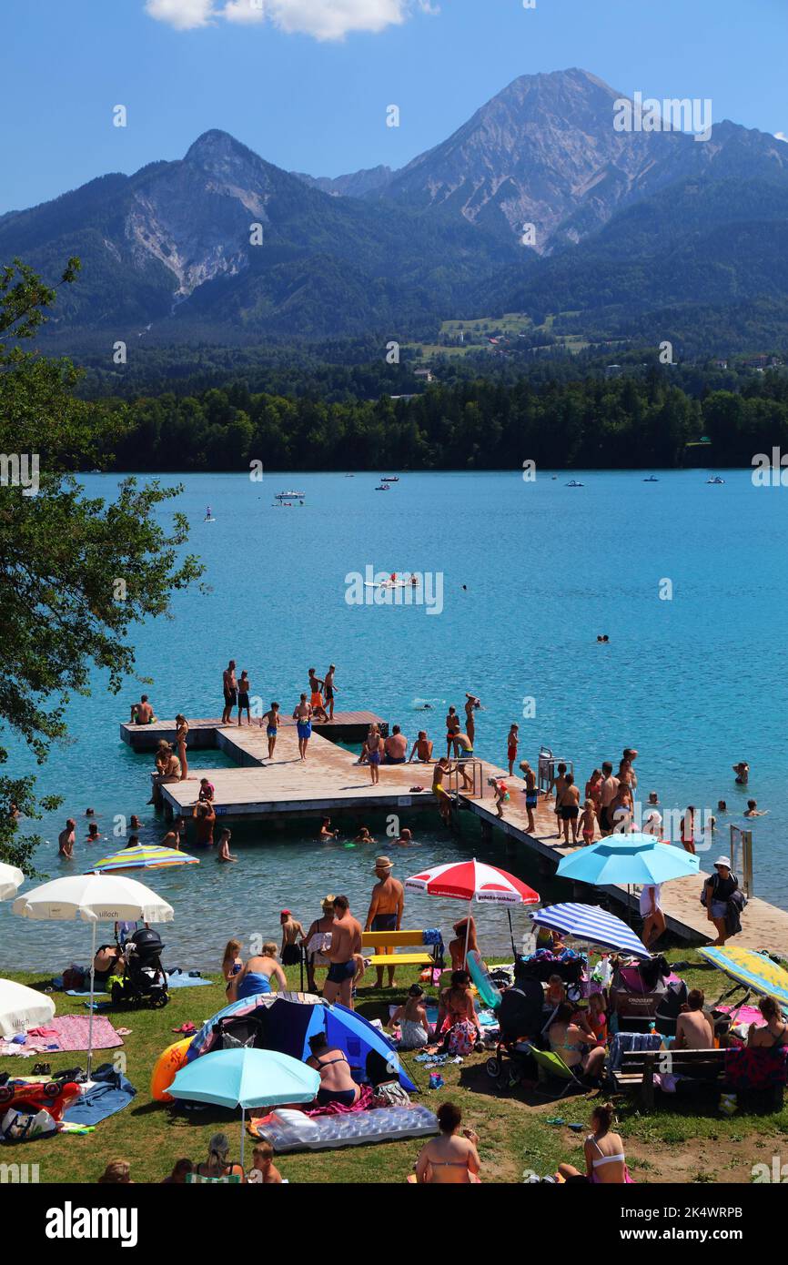 CARINTHIA, AUSTRIA - AUGUST 10, 2022: Tourists enjoy the summer at Lake ...