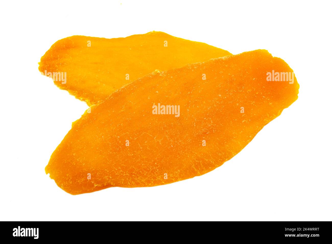 Mango isolate. Pieces of dried mango on a white background close-up ...