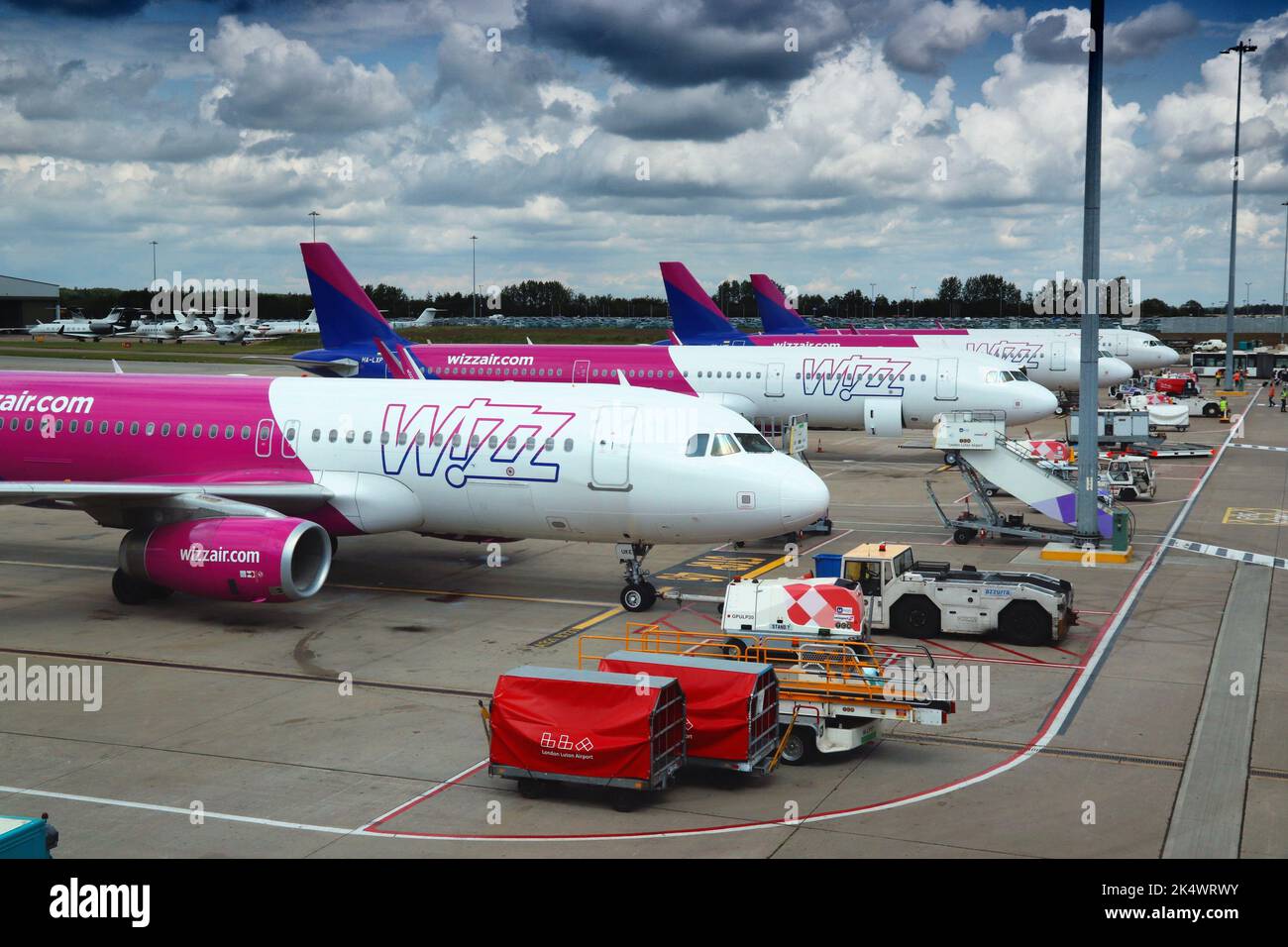 LUTON, UK - JULY 12, 2019: Wizz Air Airbus A320 fleet at London Luton ...