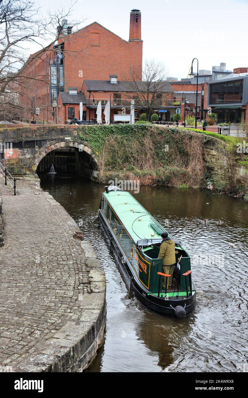 MANCHESTER, UK - APRIL 21, 2013: People visit Castlefield canals area ...