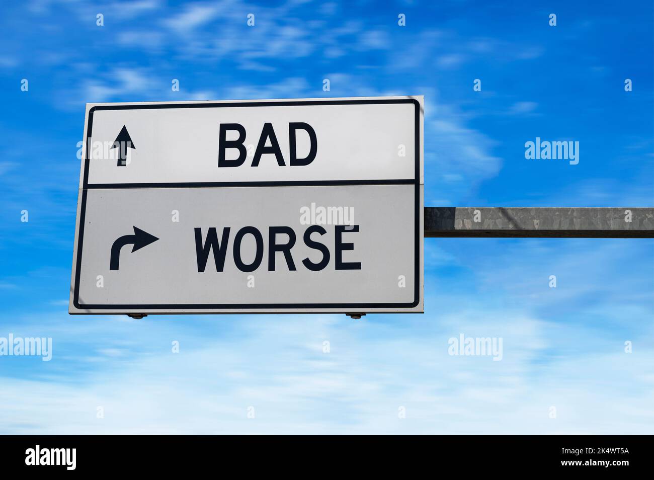 Two arrow sign with words bad and worse Stock Photo - Alamy