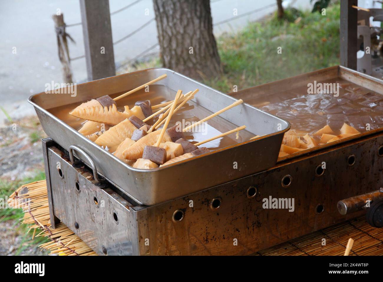 Japanese cuisine. Street food in Kyoto, Japan. Cooked bamboo shoots ...