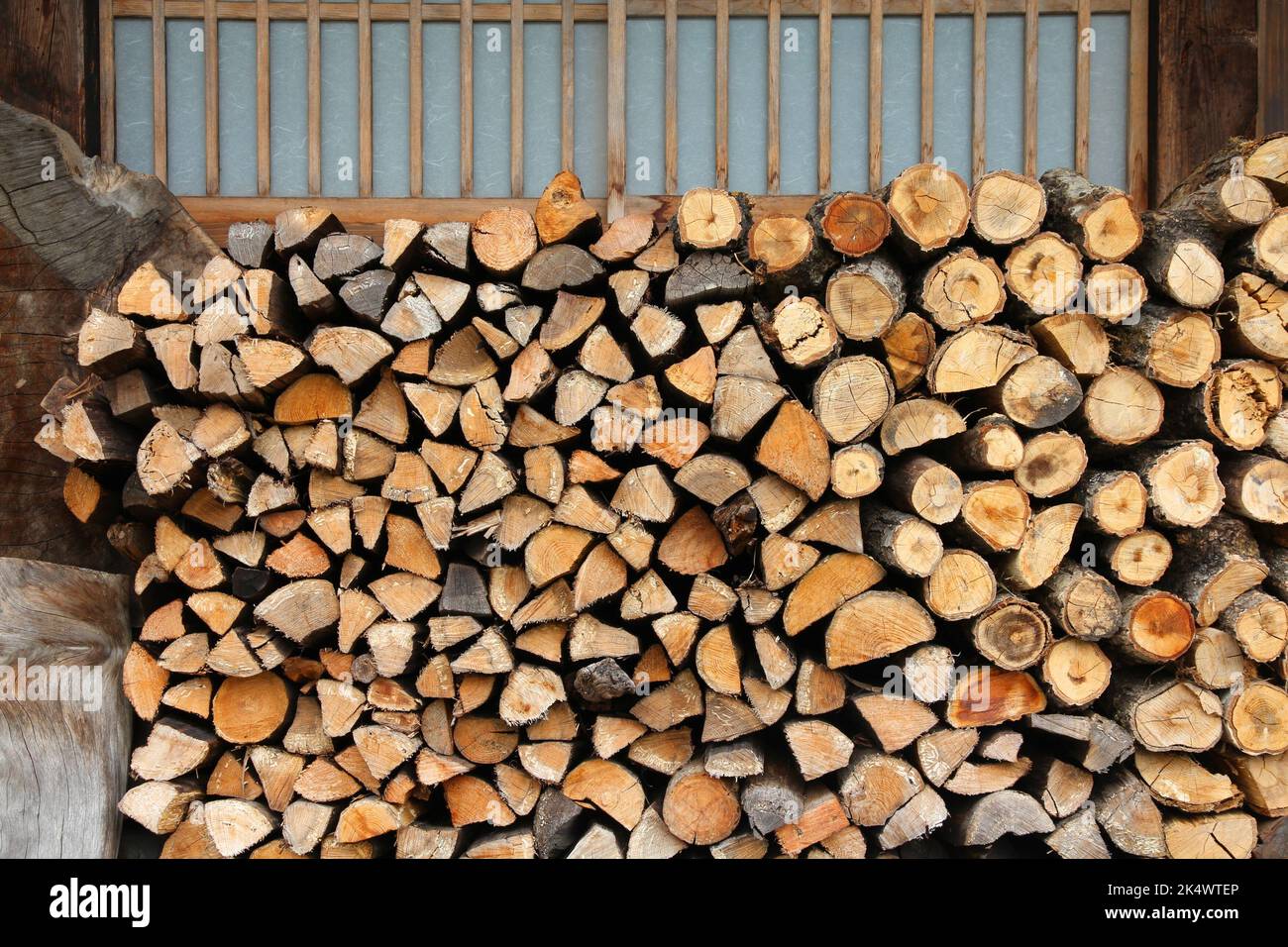 Japan - firewood stack next to a traditional rural home in Shirakawa-Go ...