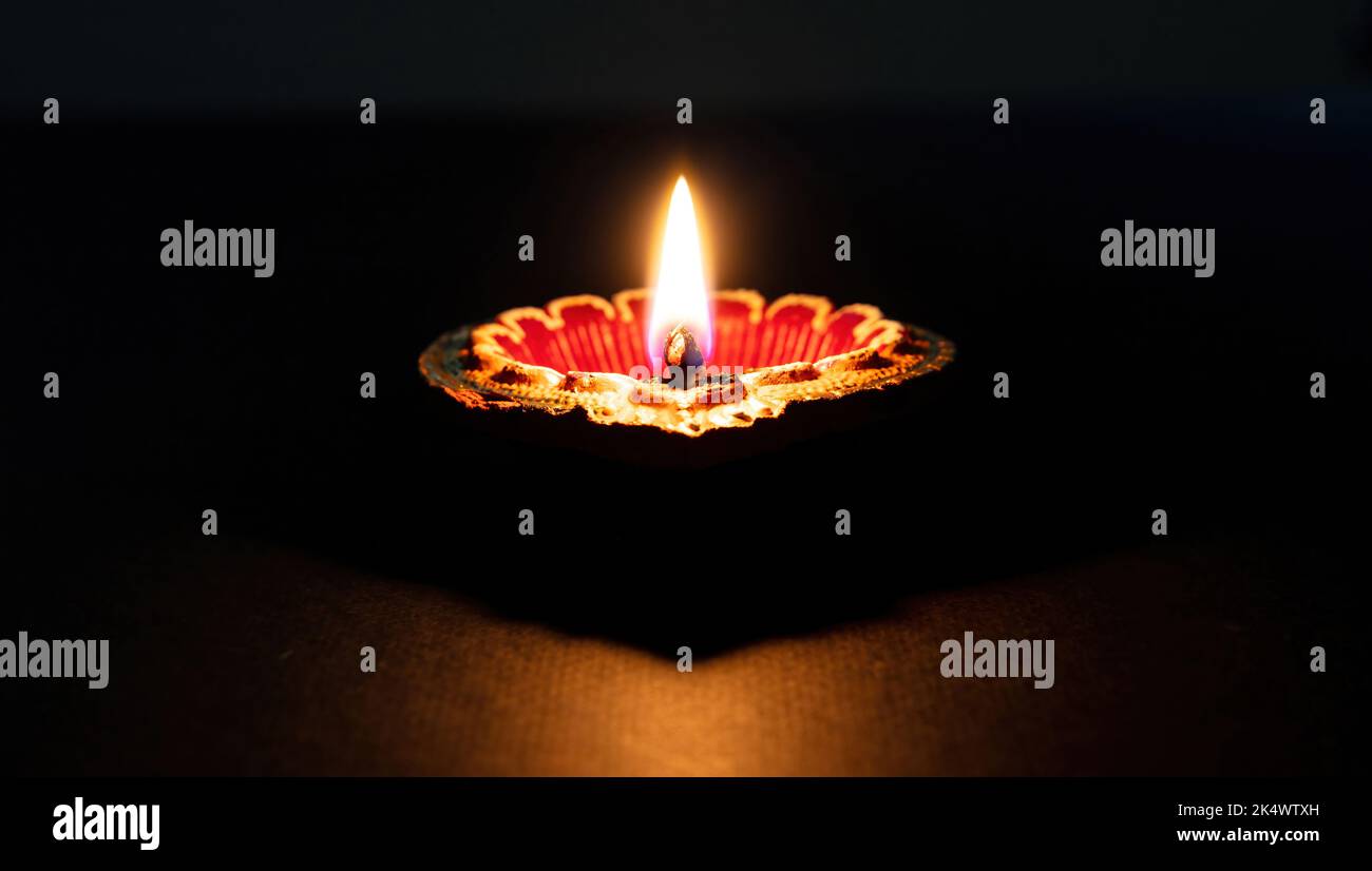 Happy Diwali. Deepavali Hindu festival of lights. Clay diya candle. Oil ...