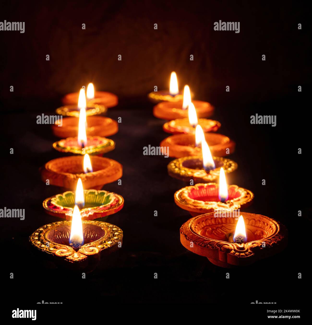 Diwali. Deepavali Hindu festival of lights. Clay diya candles in rows ...