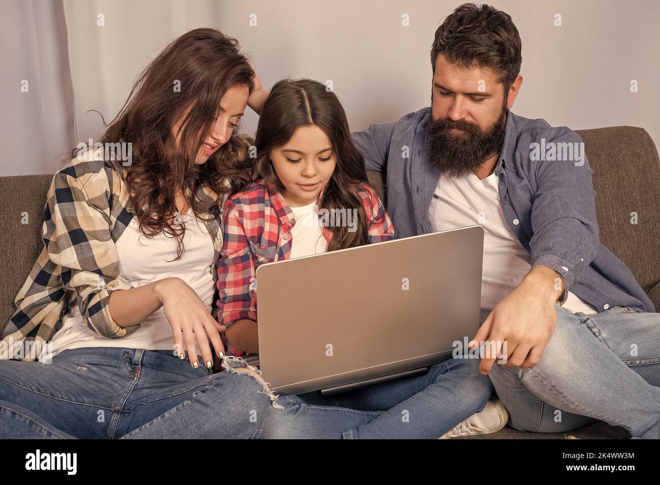 happy parents with kid girl elearning online. mom dad and daughter ...