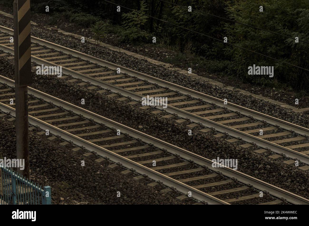 Railroad tracks seen in the foreground Stock Photo - Alamy