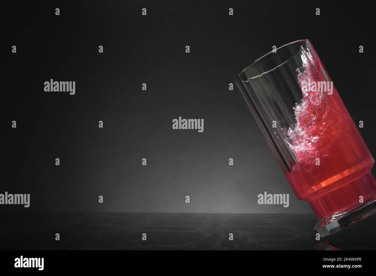 Sloshing tropical drink or cocktail Stock Photo - Alamy