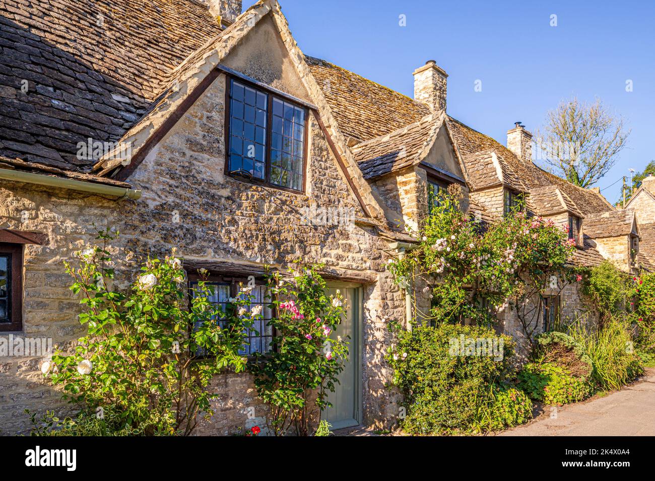 Early morning light in midsummer on Arlington Row in the Cotswold ...