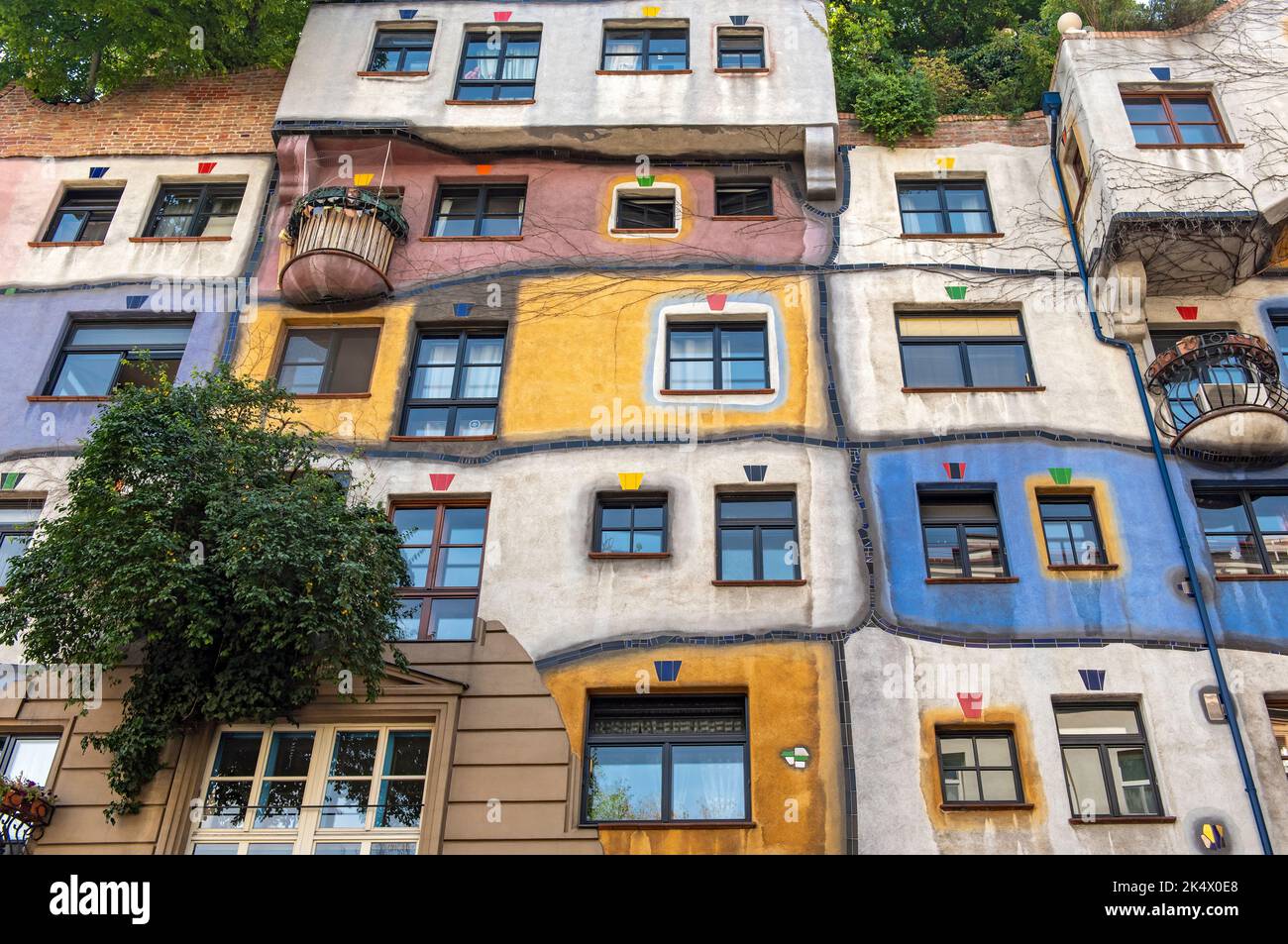 Colorful Facade of Hundertwasserhaus, apartment house designed by ...