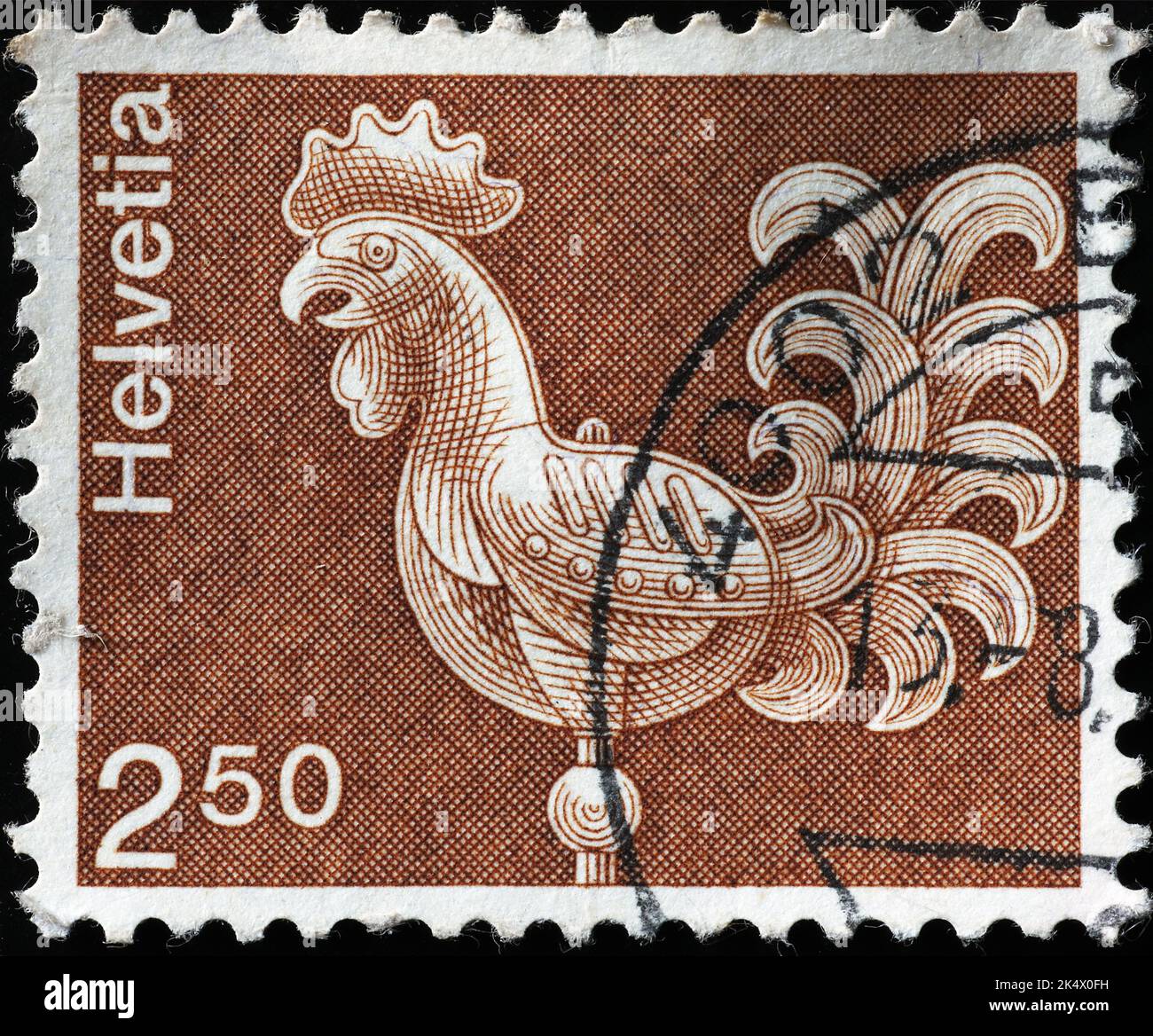 Rooster-shaped weather vane on swiss postage stamp Stock Photo - Alamy