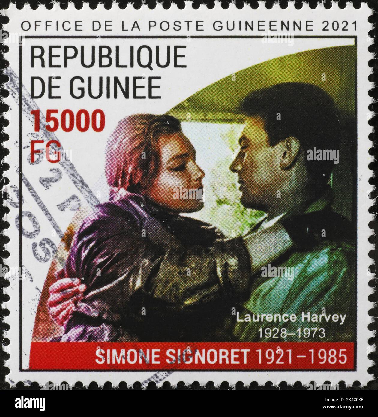 Simone Signoret and Laurence Harvey on postage stamp Stock Photo - Alamy