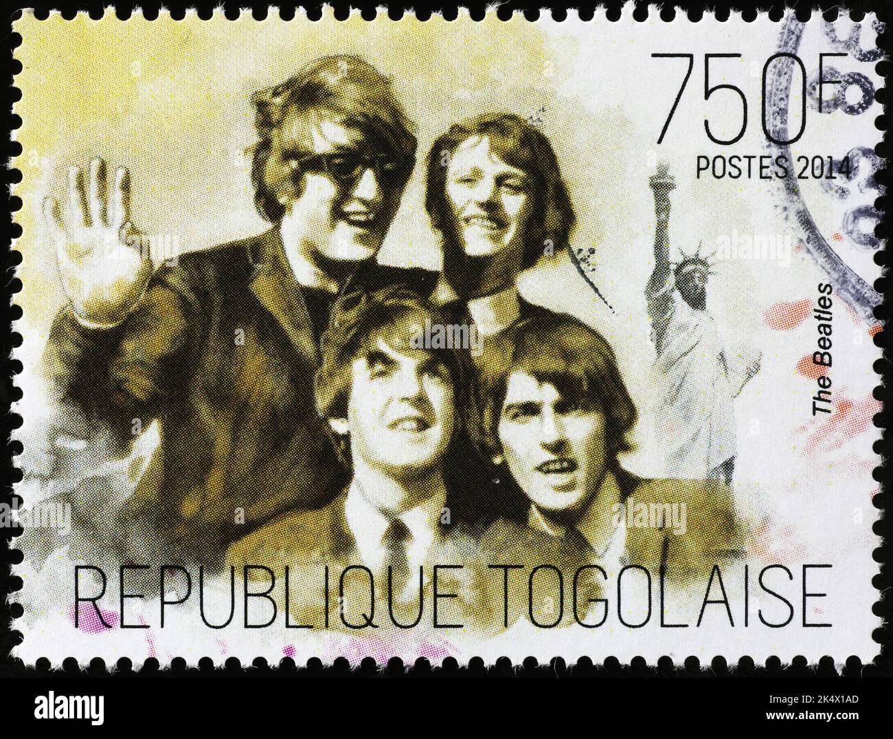 The Beatles during their North American tour on stamp Stock Photo - Alamy