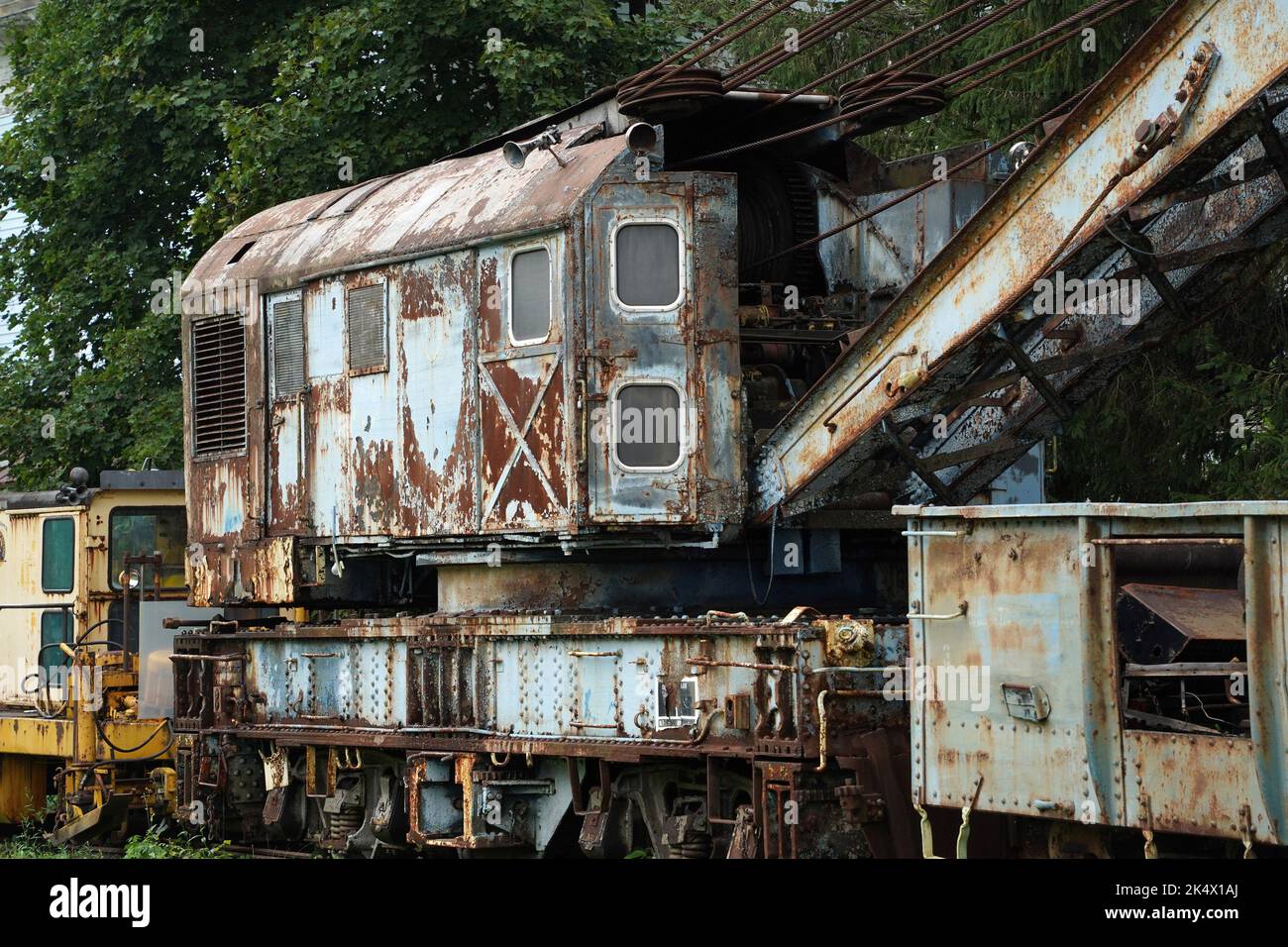 old rusted train crane abandoned in railroad Stock Photo - Alamy