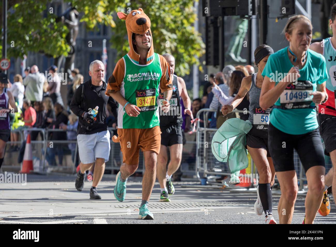 TCS London Marathon 2022 takes place today. Runners run past Houses of ...