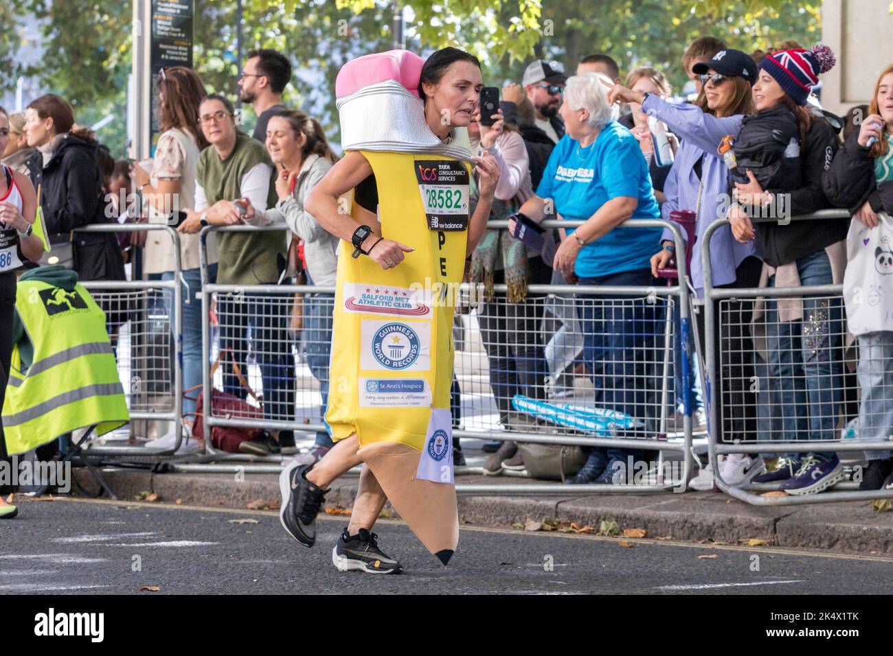 TCS London Marathon 2022 takes place today. Runners run past Houses of ...