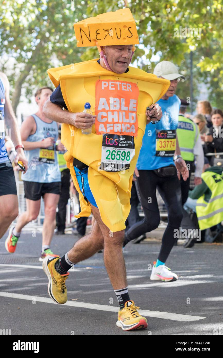 TCS London Marathon 2022 takes place today. Runners run past Houses of ...