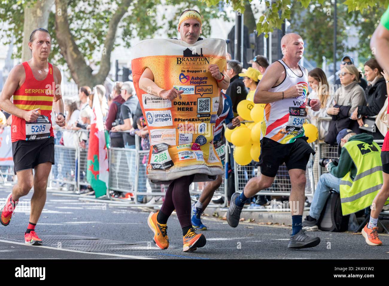 TCS London Marathon 2022 takes place today. Runners run past Houses of ...