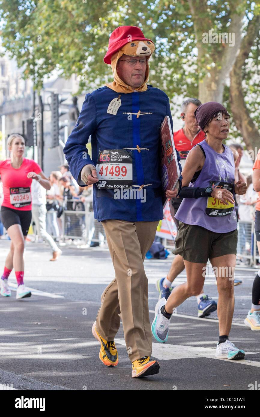 TCS London Marathon 2022 takes place today. Runners run past Houses of ...
