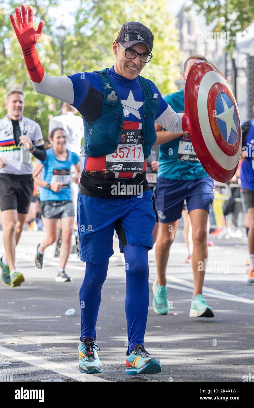 TCS London Marathon 2022 takes place today. Runners run past Houses of ...